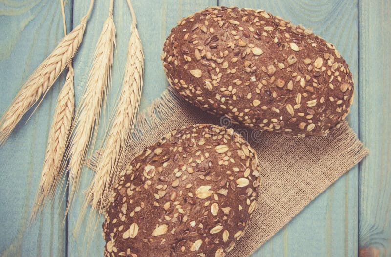 Multi-grain Bread Rolls on on Blue Wooden Table Stock Image - Image of ...
