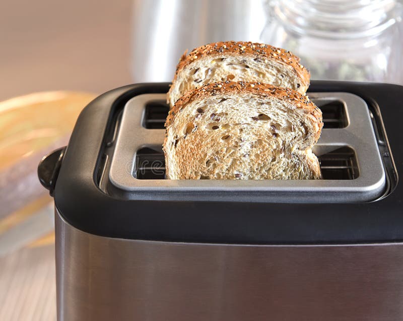 Multi-grain Bread in Toaster Stock Photo - Image of organic, object ...