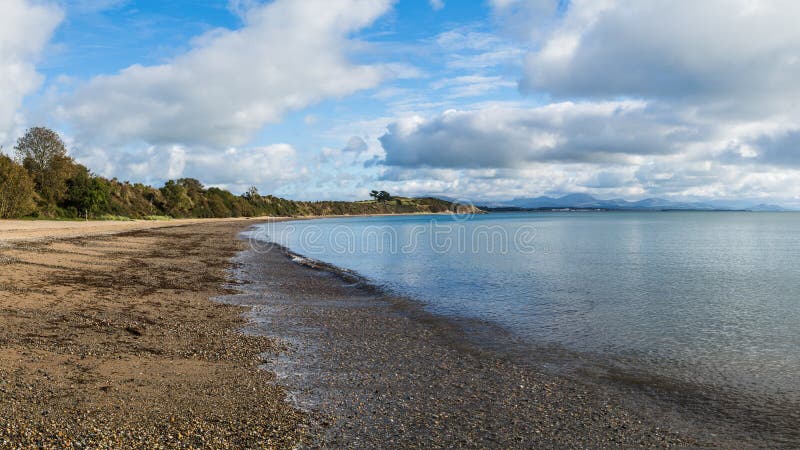 Llanbedrog beach panorama stock image. Image of space - 231784717
