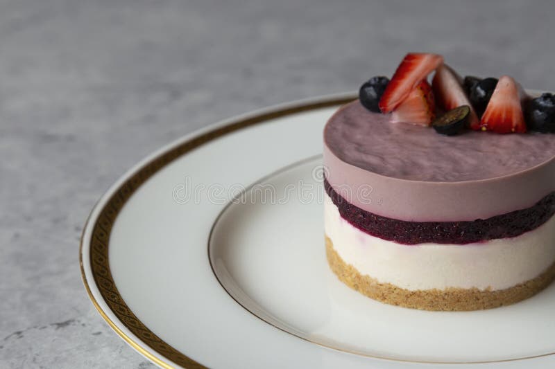 Dessert with Different Layers of Flavors and Fruit Decoration Stock ...