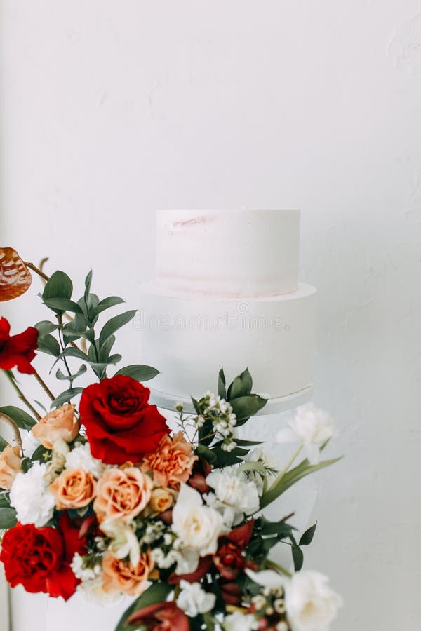 Multi-level Cake with a Decor of Red Roses. Stock Image - Image of ...