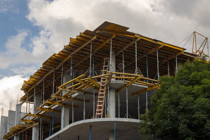 Multi-level Commercial High-rise Building Construction with Blue Sky ...