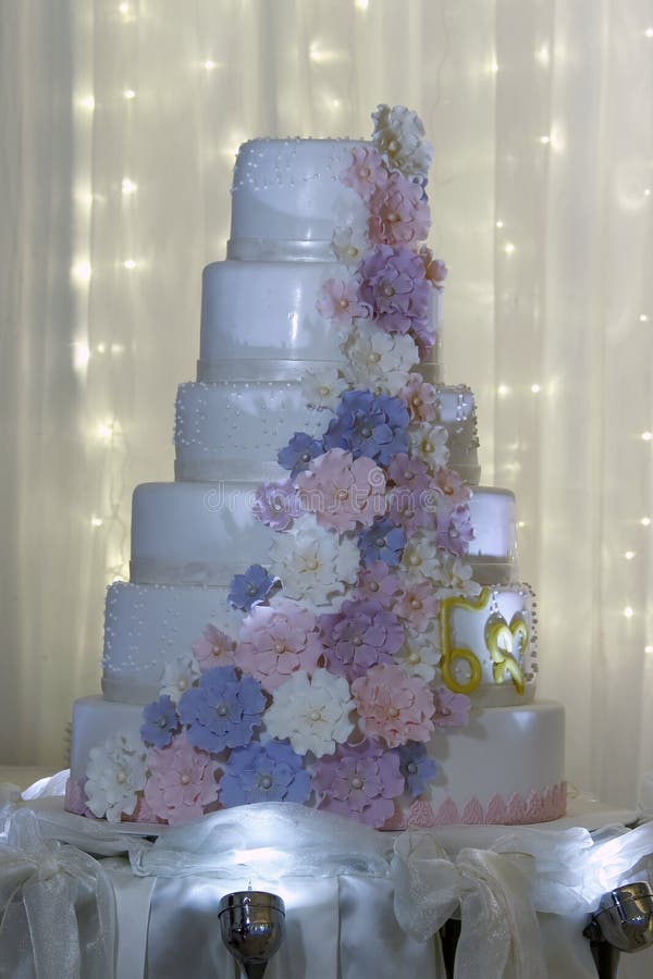 Multi Level White Wedding Cake with Pink Flowers. Stock Photo - Image ...