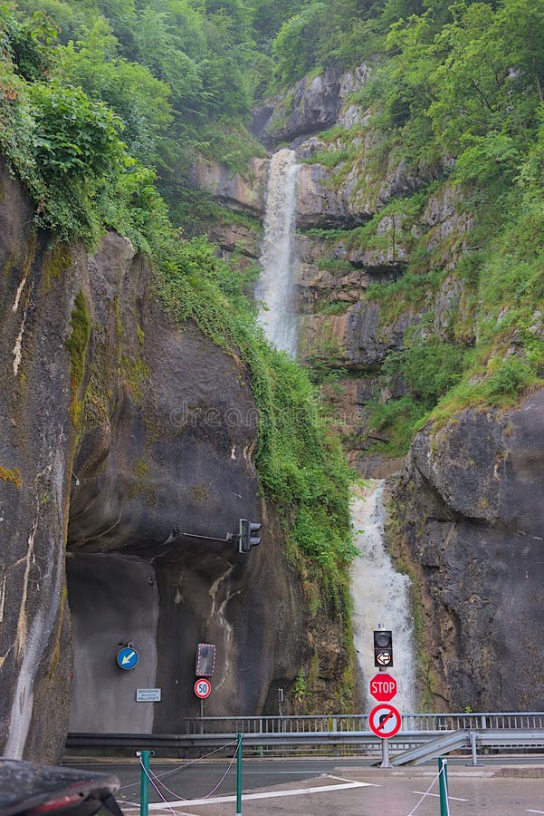 The Multi-meter Muhlbach Waterfall and the Beginning of the Road Tunnel ...