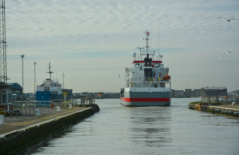 Ship moving through a lock stock image. Image of specialized - 38932015