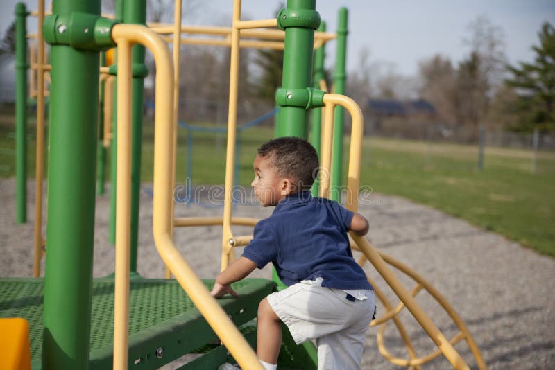 Multi-racial Boy at the Park Stock Image - Image of happy, smiling ...