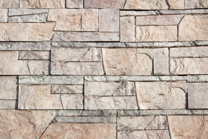 Multi-Sized Tan Stone Wall stock image. Image of masonry - 10610443
