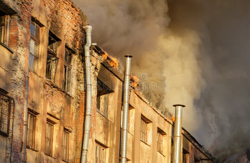 The Multi-storey Abandoned Building is Completely Engulfed in Fire and ...