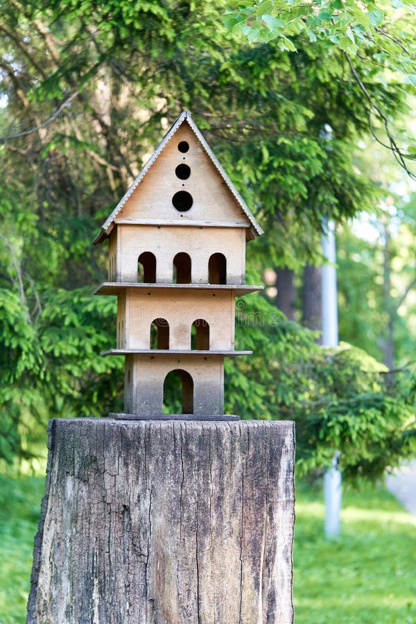 Multi-storey Bird House on a Tree Stump in the Park Stock Image - Image ...