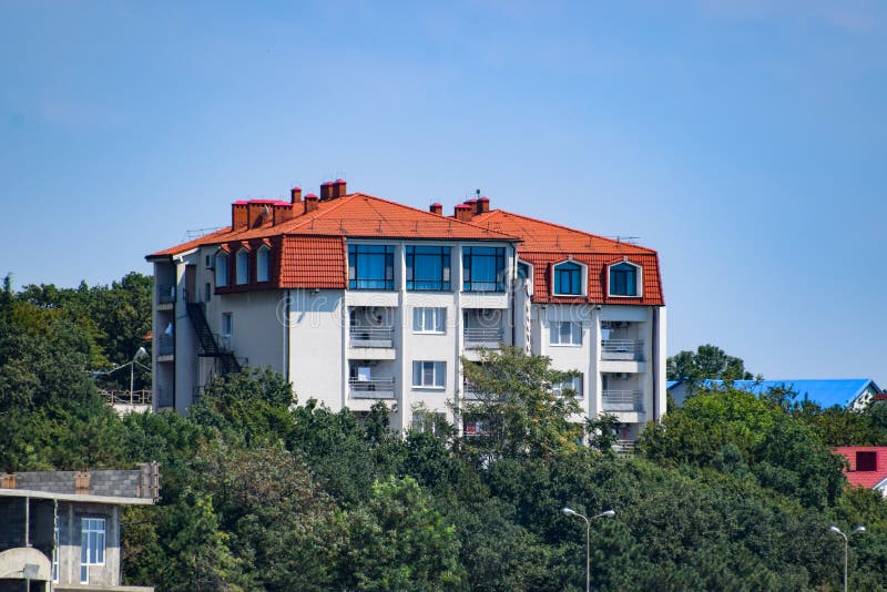 A Multi-storey House on a Mountain. Hotel for Holidaymakers Stock Image ...