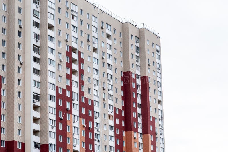 Multi-storey Modern New Red Residential Building Against the Sky Stock ...