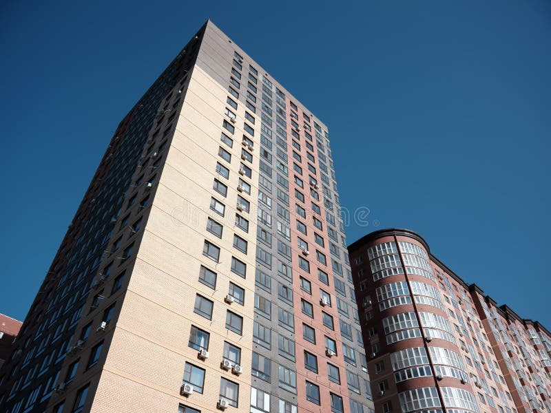 Multi-storey Residential Buildings in a New Complex Against a Clear Sky ...