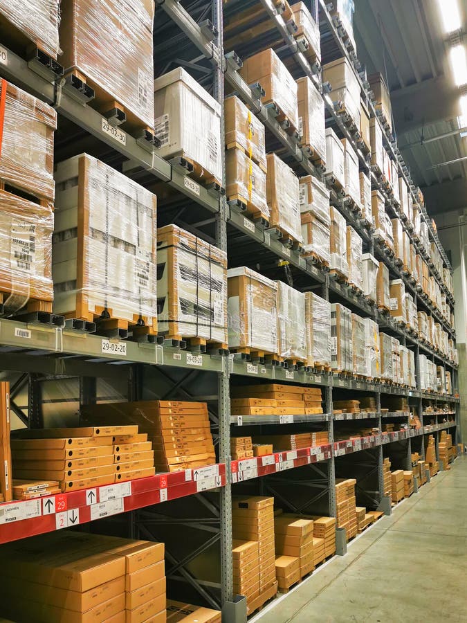 Multi-tiered Shelves with Goods in a Large Warehouse Stock Photo ...