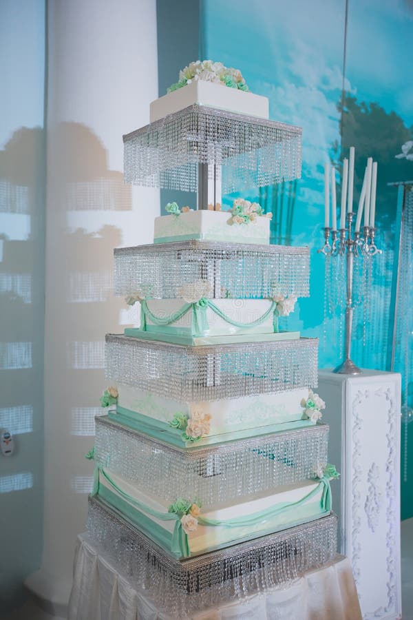 Multi- Tiered Wedding Cake with Beading at the Banquet. Stock Image ...