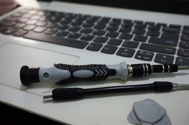 Multi-Tool Screwdrivers on a Laptop Keyboard Stock Image - Image of ...
