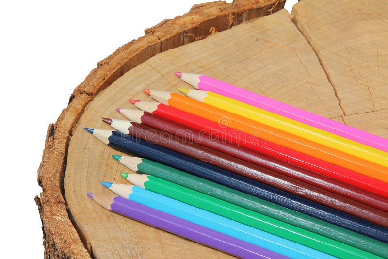 Multicolor Crayons on a Tree Trunk Stock Image - Image of pencil ...