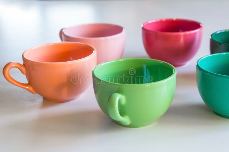Multicolor Cup S on a Table Stock Image - Image of funny, kitche: 50952049