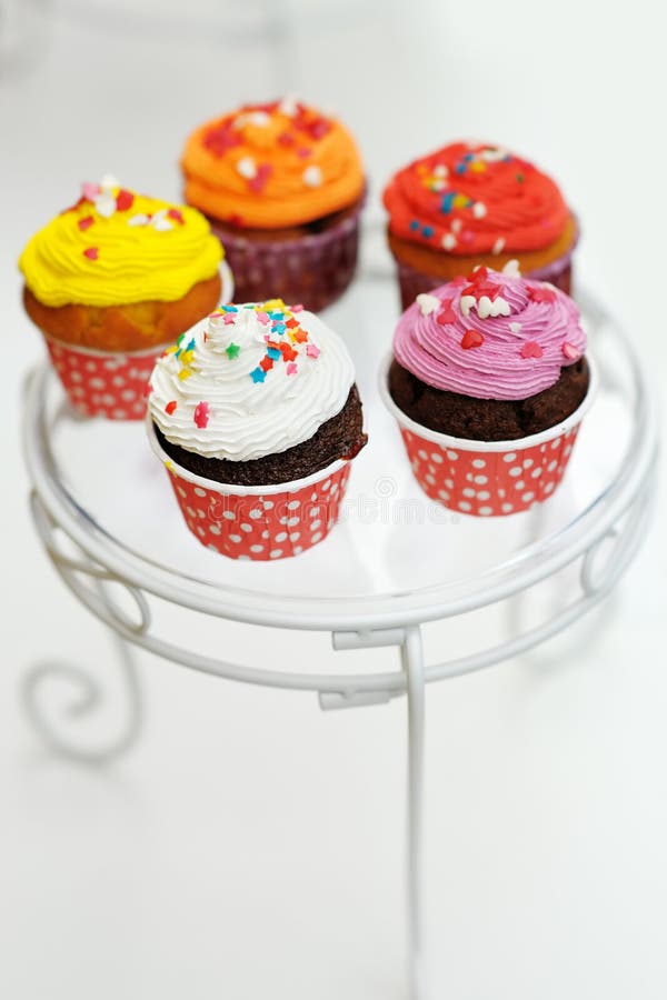 Multicolor cupcakes stock image. Image of dessert, biscuit - 43644621
