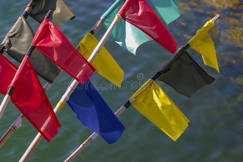 Close Up on Multicolor Net Marker Flags on a Traditional Fishing Boat ...