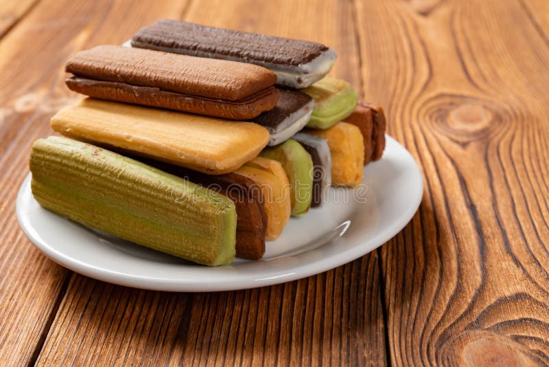 Multicolor Sandwich Cookies on Wood Table with Copy Space Stock Image ...