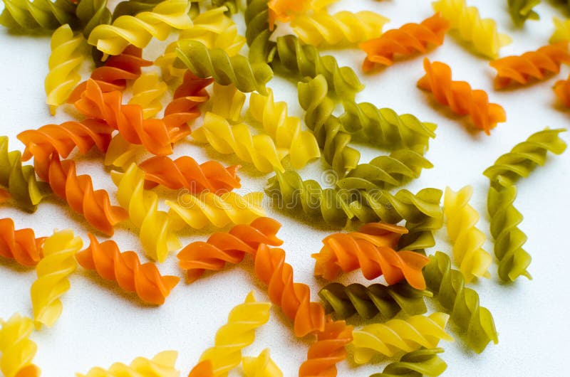 Multicolor spiral pasta stock image. Image of macro, color - 70537387