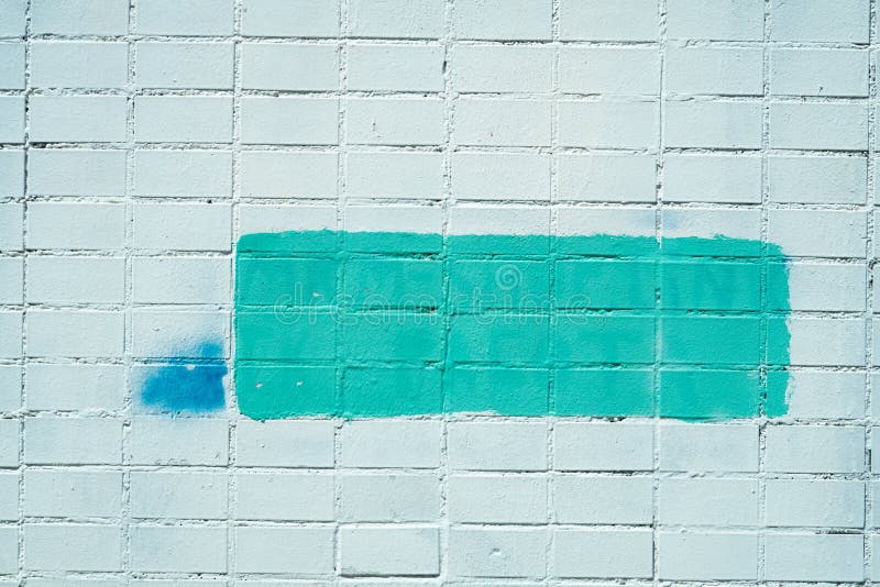 Multicolor Stains on a Brick Wall Painted with White Paint, Bright ...
