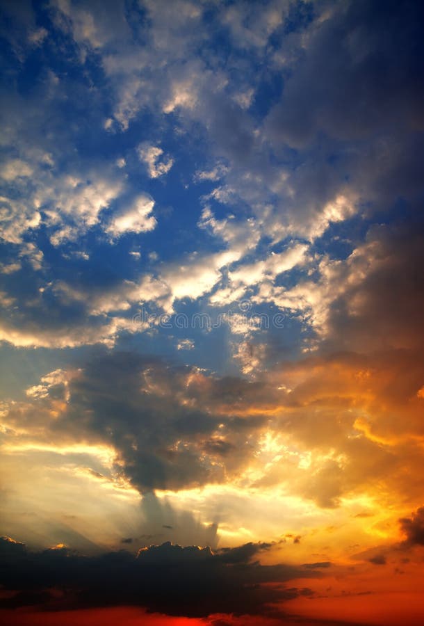 Multicolor Sunset Sky with Clouds and Sun Rays Stock Image - Image of ...