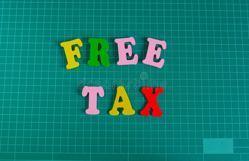 Multicolor Text Free Tax on Green Mat Stock Photo - Image of sale ...