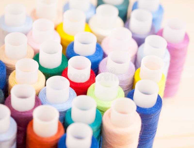 Multicolor Threads on Wooden Background Stock Photo - Image of rainbow ...