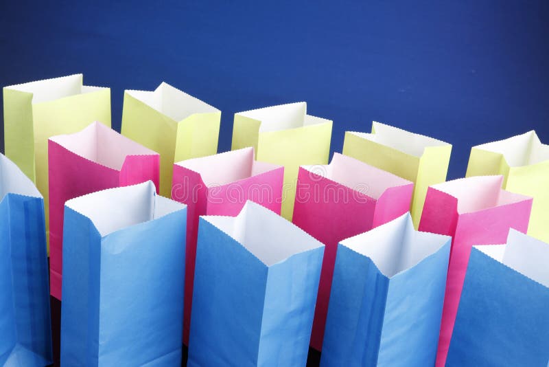 Multicolored bags on blue stock photo. Image of shopping - 10550482