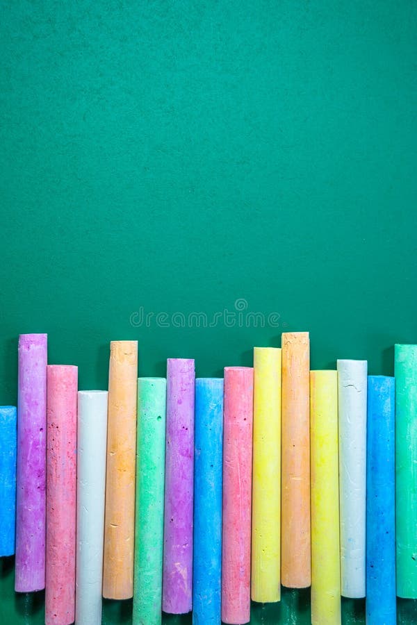 Multicolored Chalks on a Green Chalkboard Stock Image - Image of ...