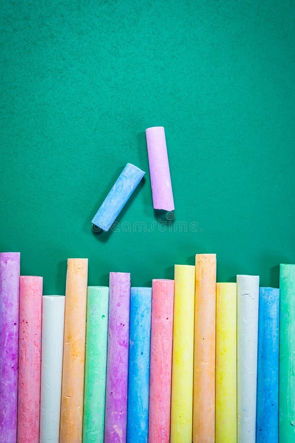 Multicolored Chalks on a Green Chalkboard Stock Image - Image of ...