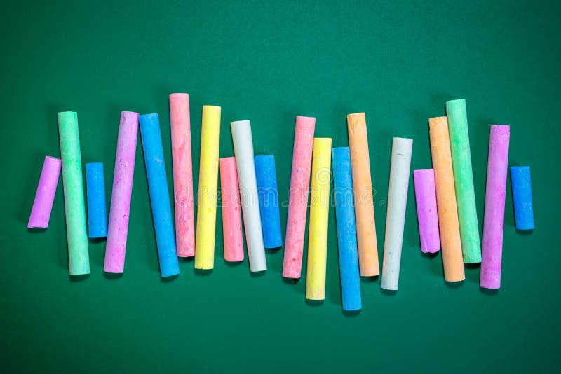Multicolored Chalks on a Green Chalkboard Stock Image - Image of ...