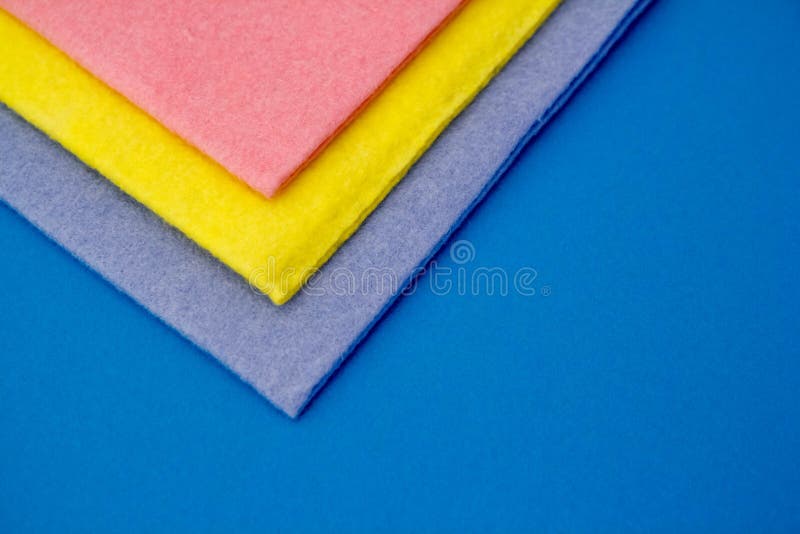 Multicolored Cleaning Rags on Blue Background. Cleaning Cloth. the View ...