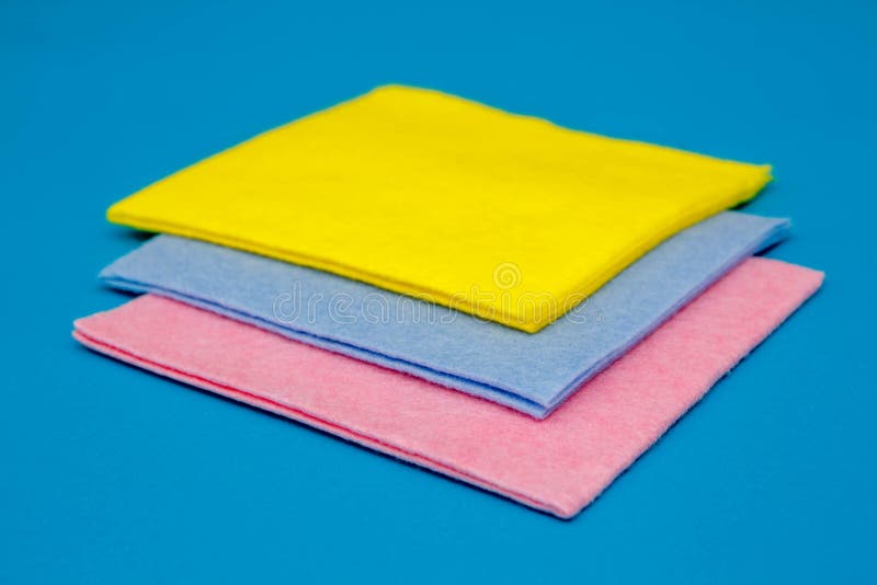 Multicolored Cleaning Rags on Blue Background. Cleaning Cloth Stock ...