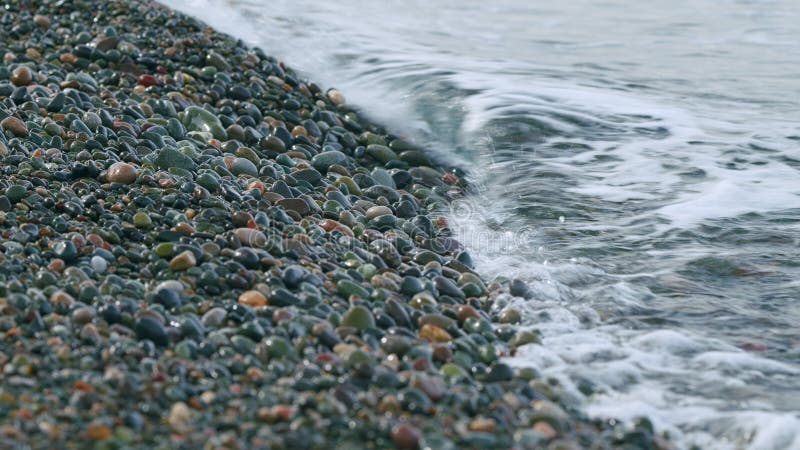 Multicolored Colorful Sea Pebbles. Pebbles Under Water. Background of ...