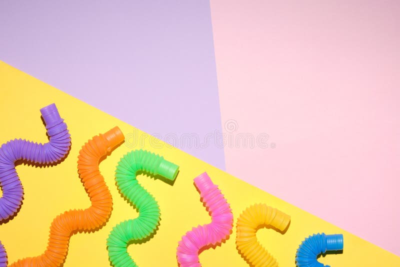 Multicolored Corrugated Plastic Pipes Poptube Toy on a Bright ...