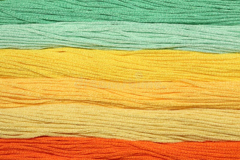 Multicolored Cotton Threads for Embroidery are Arranged in a Row Stock ...