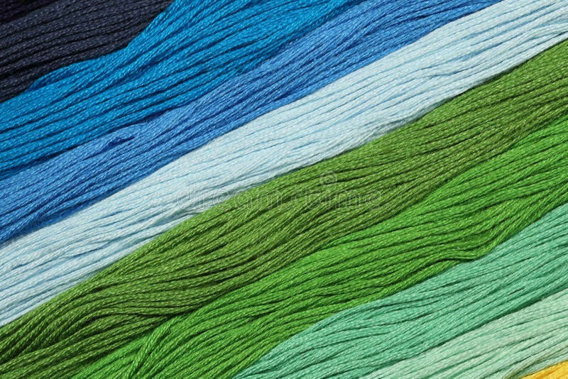 Multicolored Cotton Threads for Embroidery are Arranged in a Row Stock ...