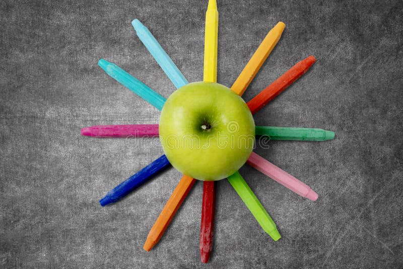 Multicolored Crayons with a Green Apple Stock Photo - Image of apple ...
