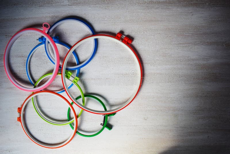 Multicolored Plastic Embroidery Hoops for Creative Art on a Light ...