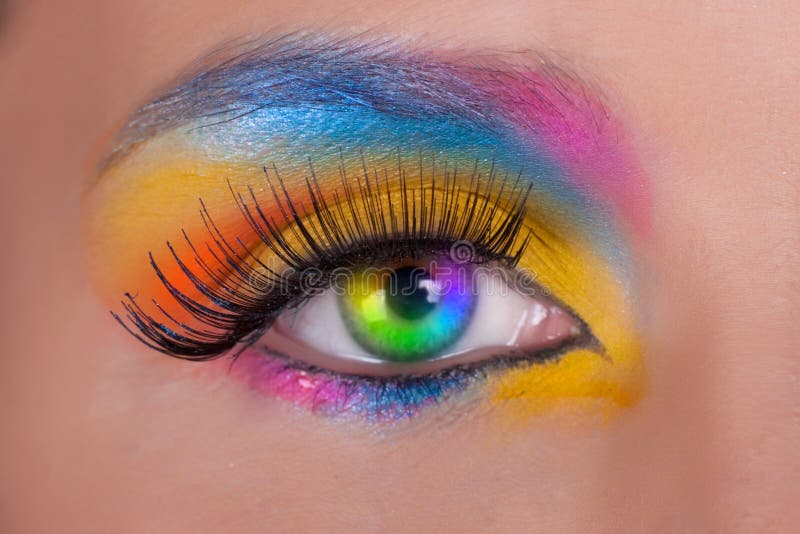 Multicolored female eyes. stock photo. Image of brows - 12925966