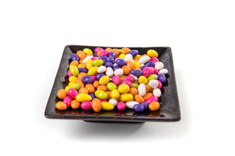 Multicolored Fennel Candy in a Black Tray Isolated Over White ...