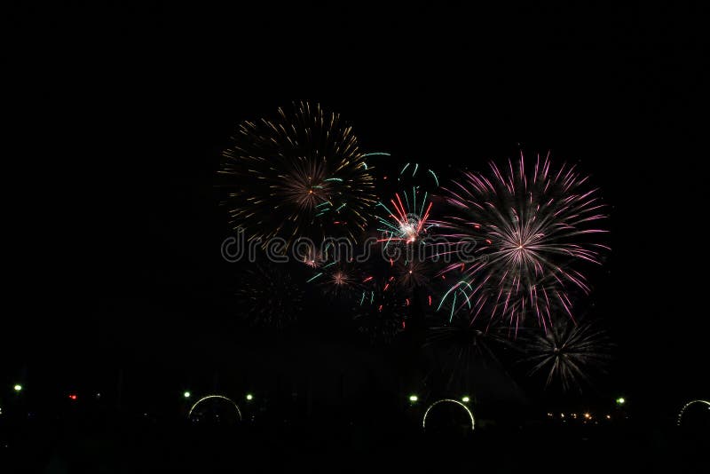 Multicolored Fireworks in the Dark Sky, City Day Celebration. Stock ...