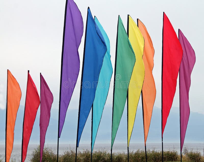 Multicolored Flags at the Beach Stock Image - Image of ocean, coast ...