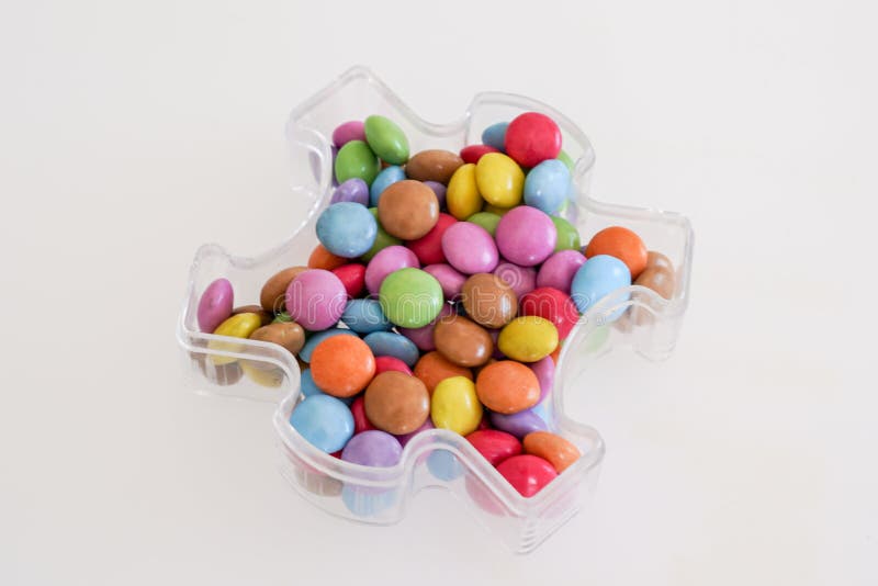 Multicolored Glazed Chocolate Candies in Plastic Box Container Stock ...