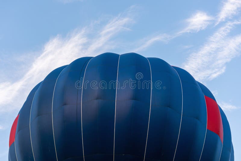 Multicolored Hot Air Balloon with Basket Rises into the Sky, Bottom ...