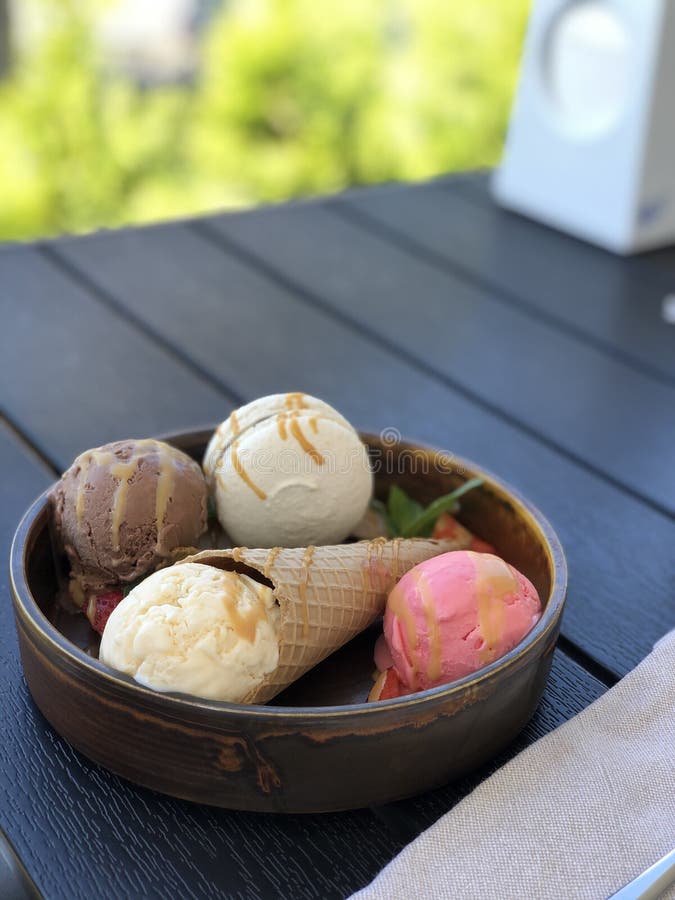 Multicolored Ice Cream with Macaroni on Plate Stock Photo - Image of ...