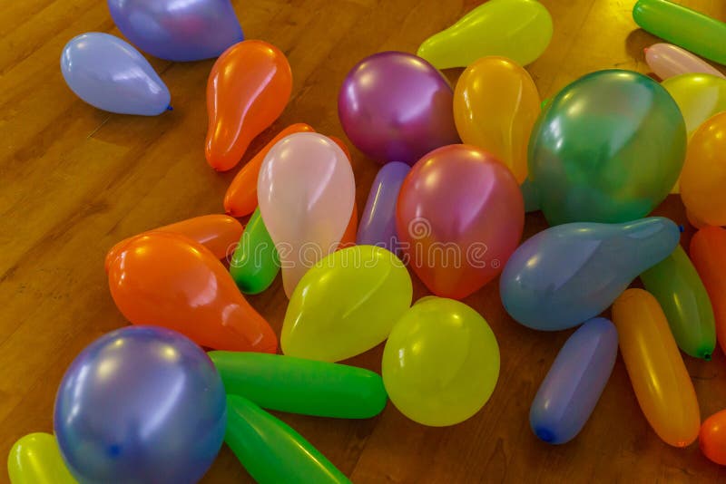 Multicolored Inflatable Balloons Scattered on the Floor Stock Photo ... Multicolored Inflatable Balloons Scattered on the Floor Stock Photo ...