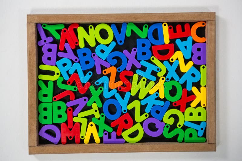 Multicolored Jumbled Alphabets Stock Photo - Image of english, people ...
